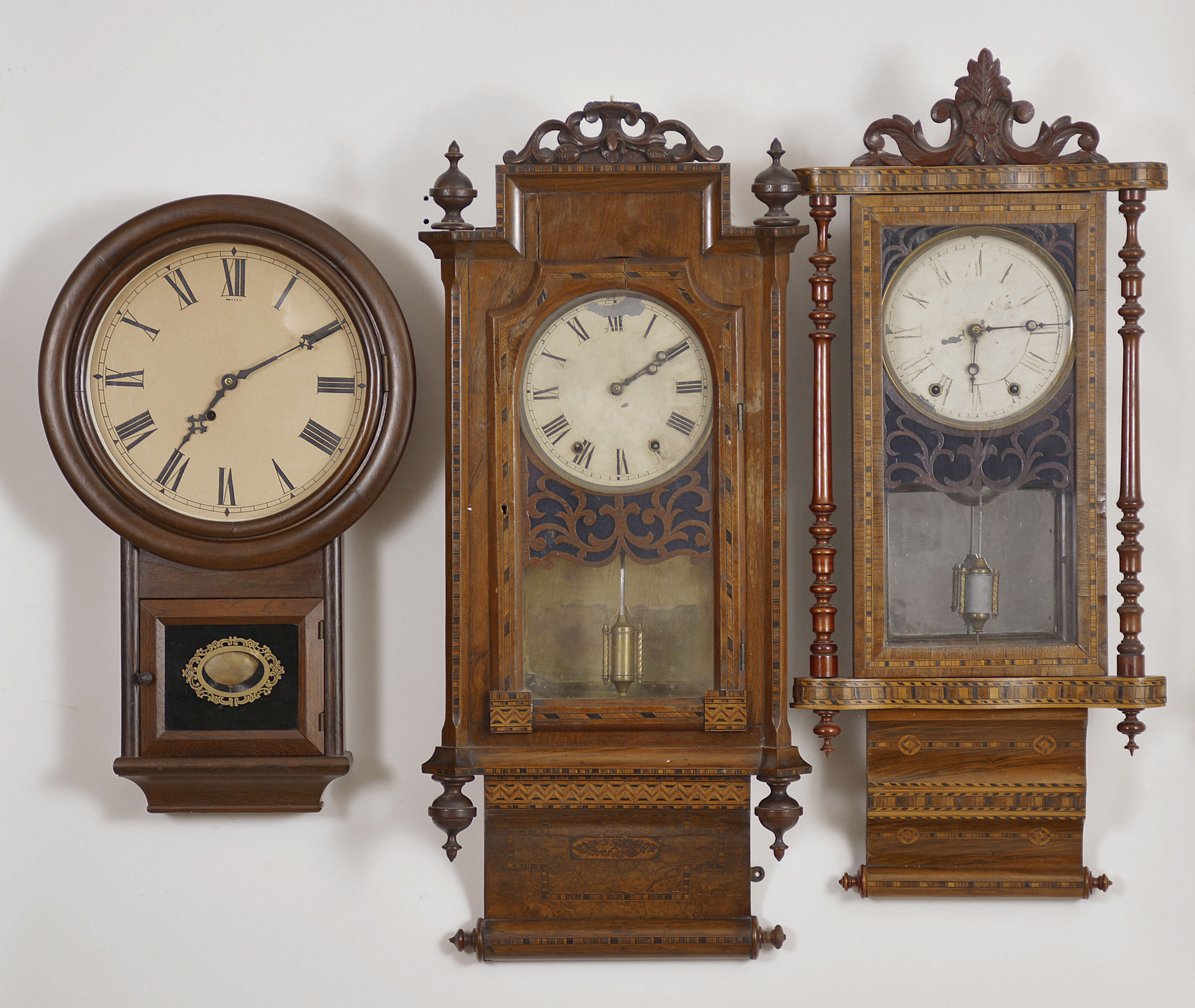 Daniel Pratt round drop and two Anglo American striking wall clocks