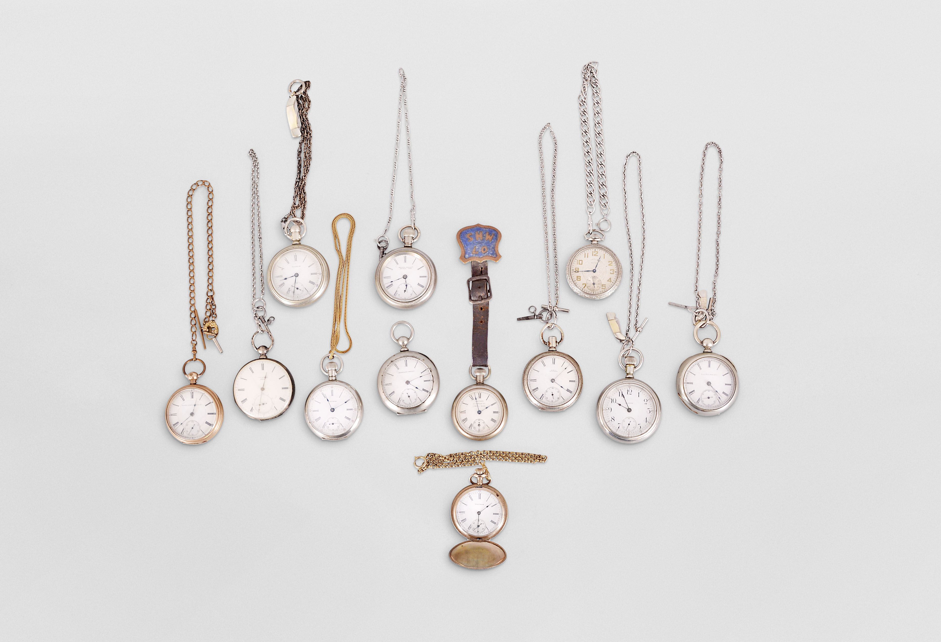 Twelve pocket watches, American and Swiss