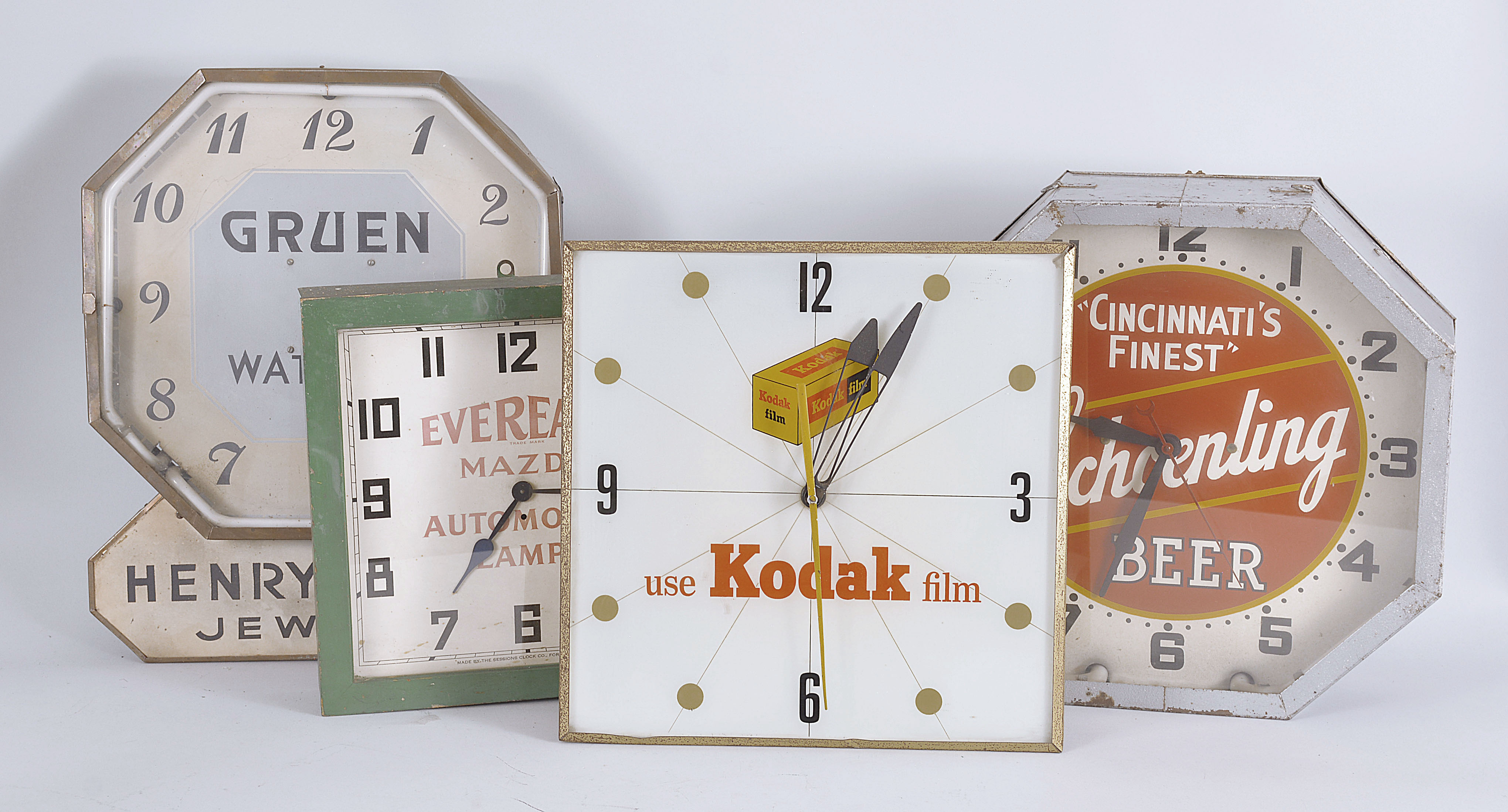 Ten clocks including Bulle and many electric advertising clocks