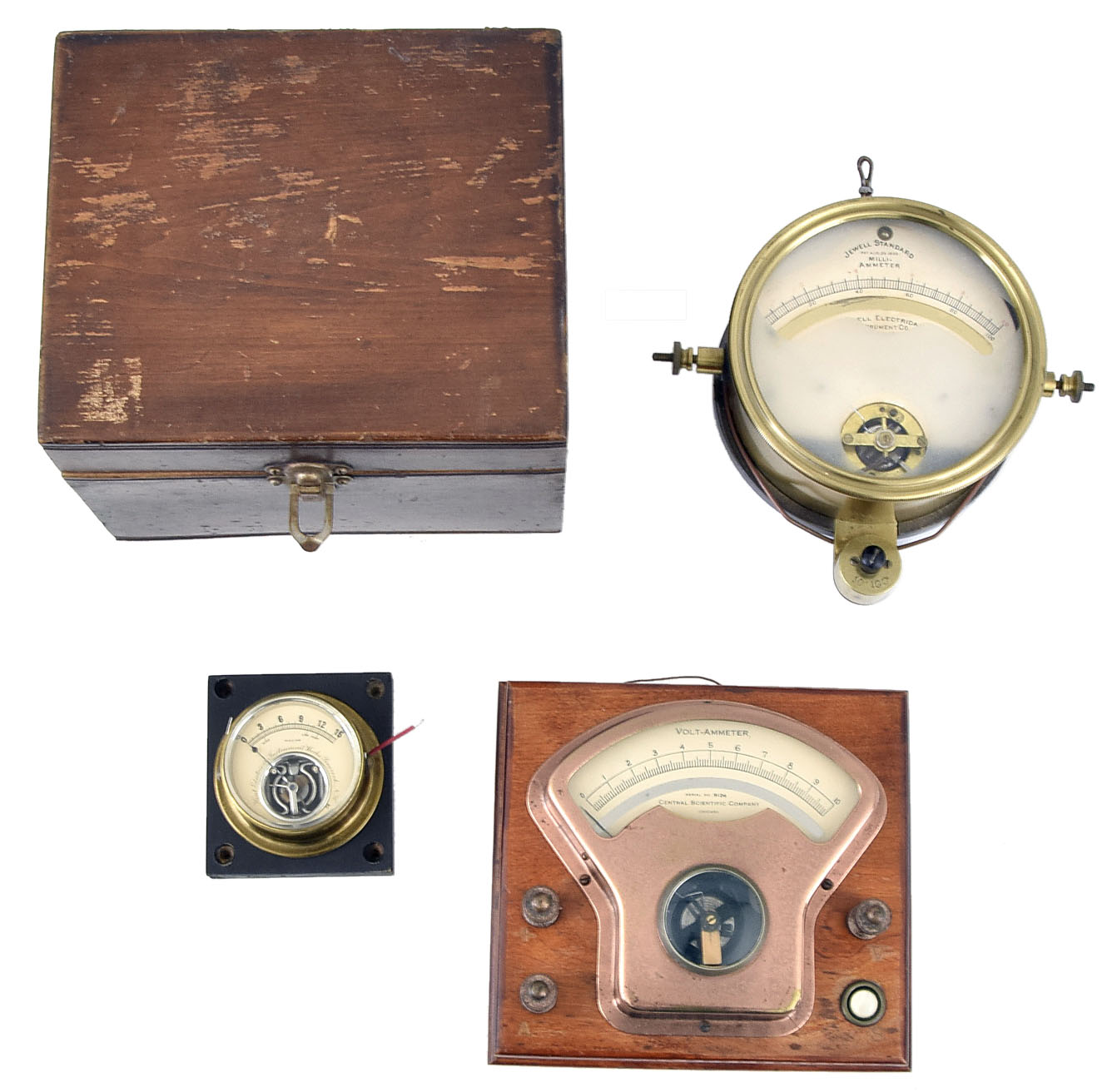Four analog electrical meters and a Westinghouse radio receiver in wood ...