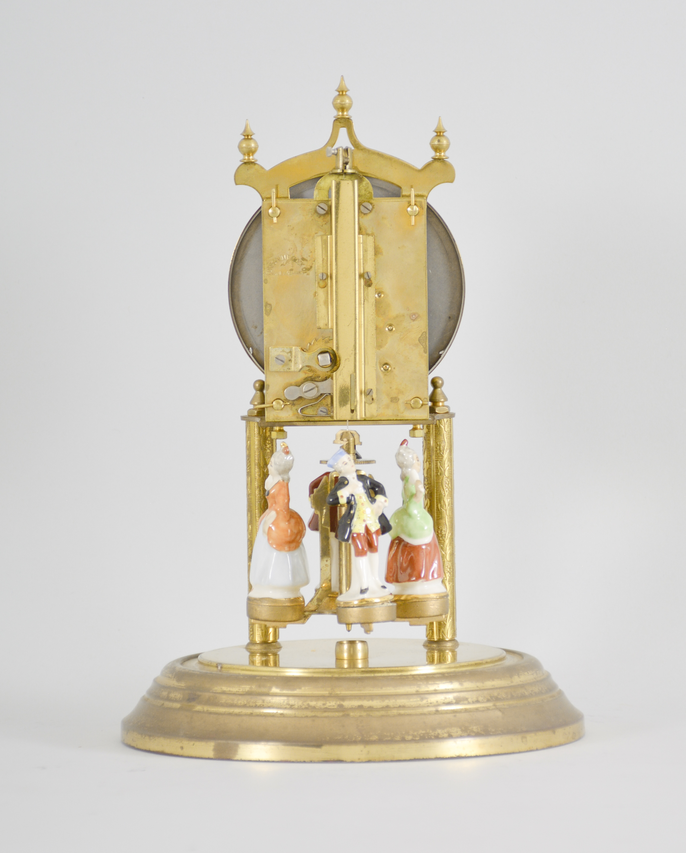 Forestville Clock Co. 400-day clock with four ceramic figures on the ...