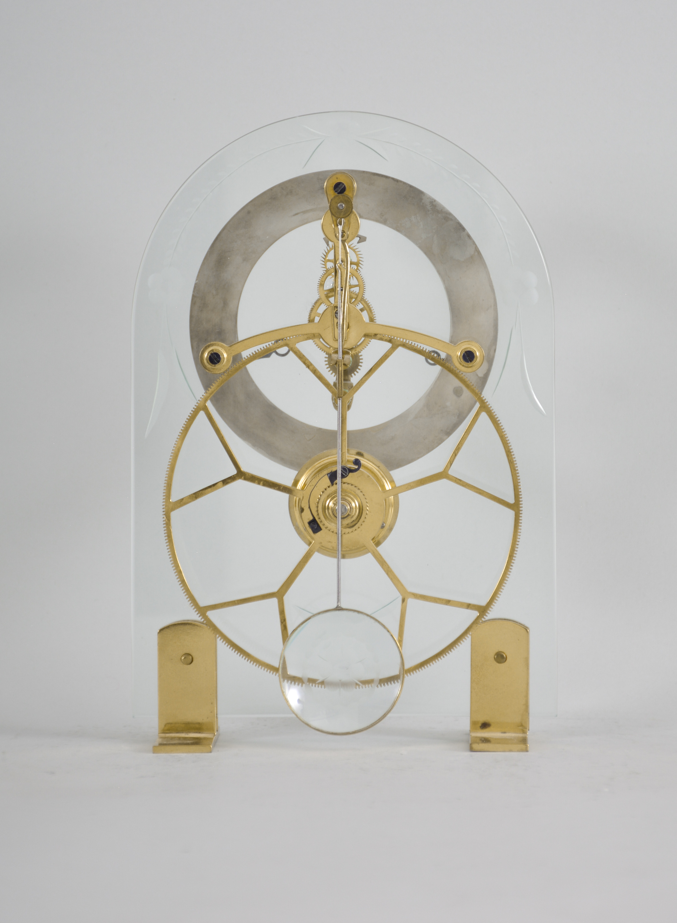 Reproduction skeleton clock mounted to etched glass plate
