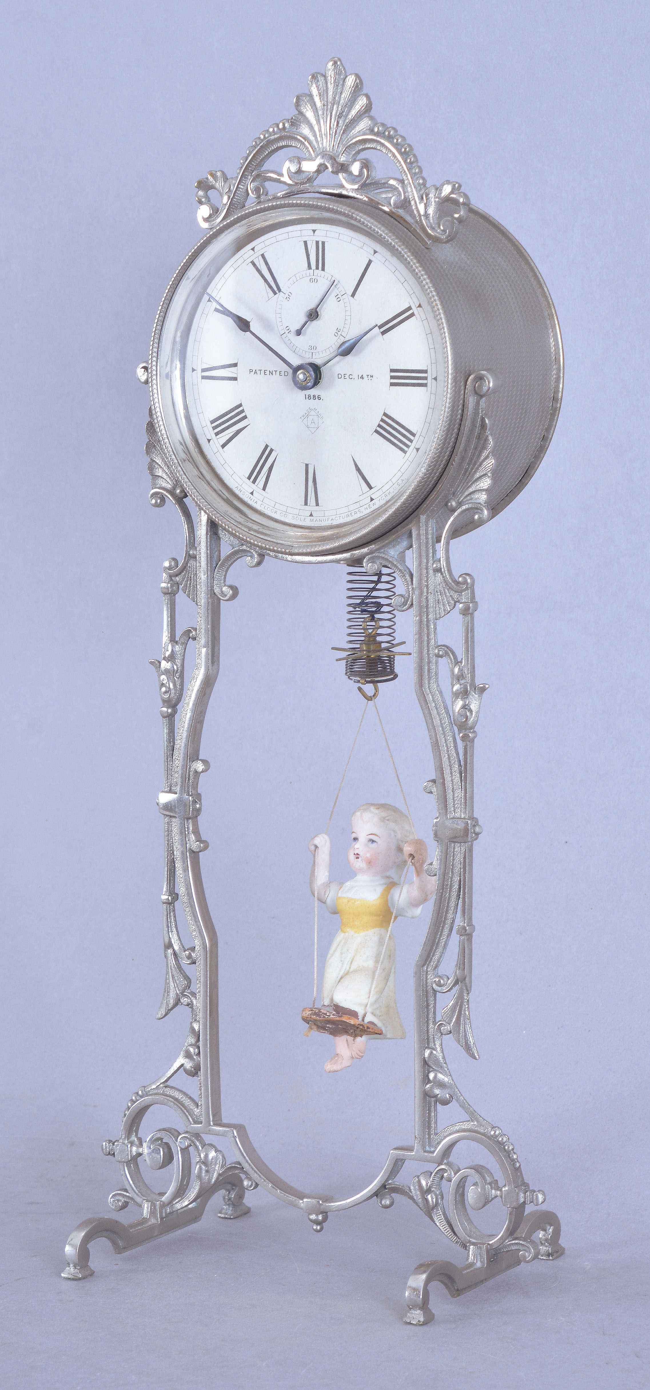 Ansonia Clock Co., New York, NY, "Jumper No. 2", bobbing doll clock.